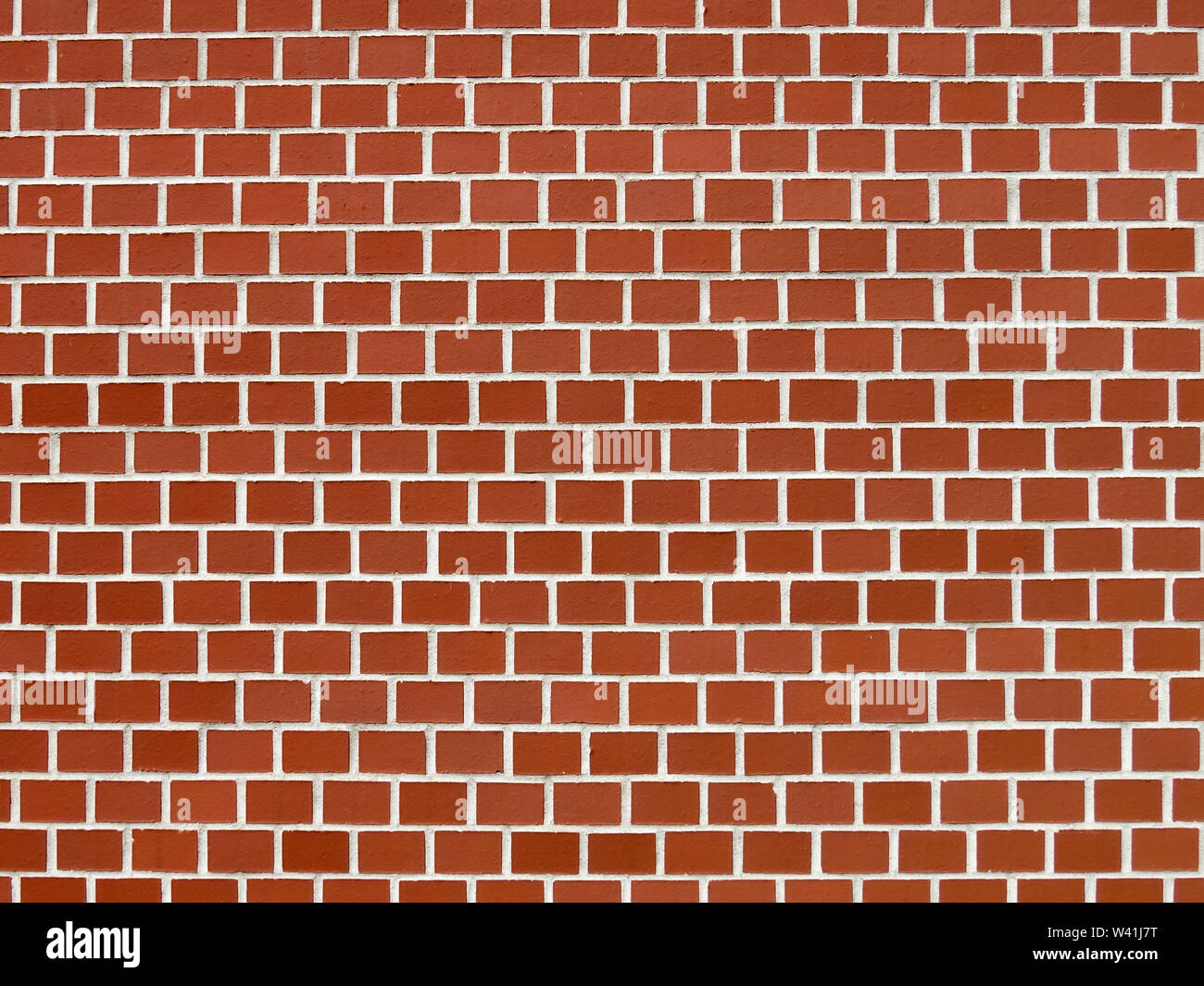 Wall background of perfectly lined up red bricks Stock Photo - Alamy