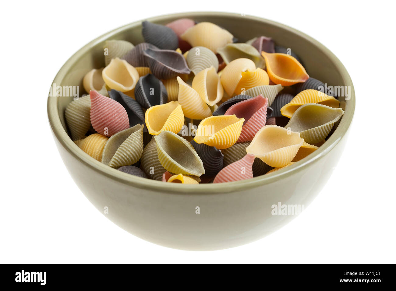 Cup with five color shell pasta isolated on white background Stock ...