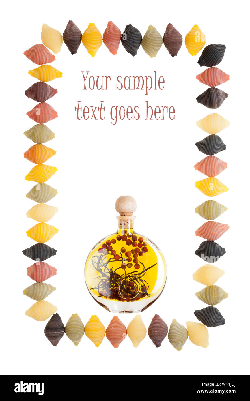 Decorative frame of five color shell pasta and bottle with olive oil ...