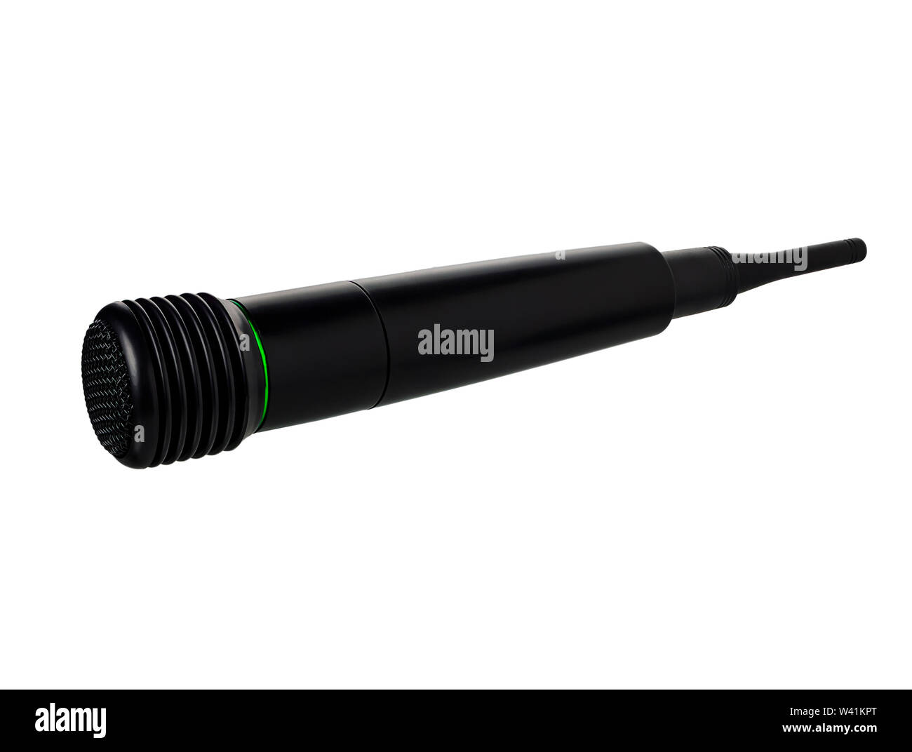 A black microphone with a cord lies on a white background. Isolate ...