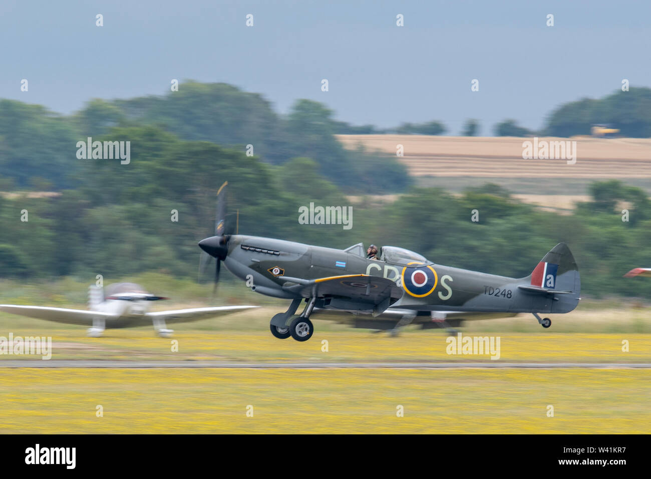 Supermarine Spitfire Mk XVI (G-OXVI) lands at Flying Legends ...