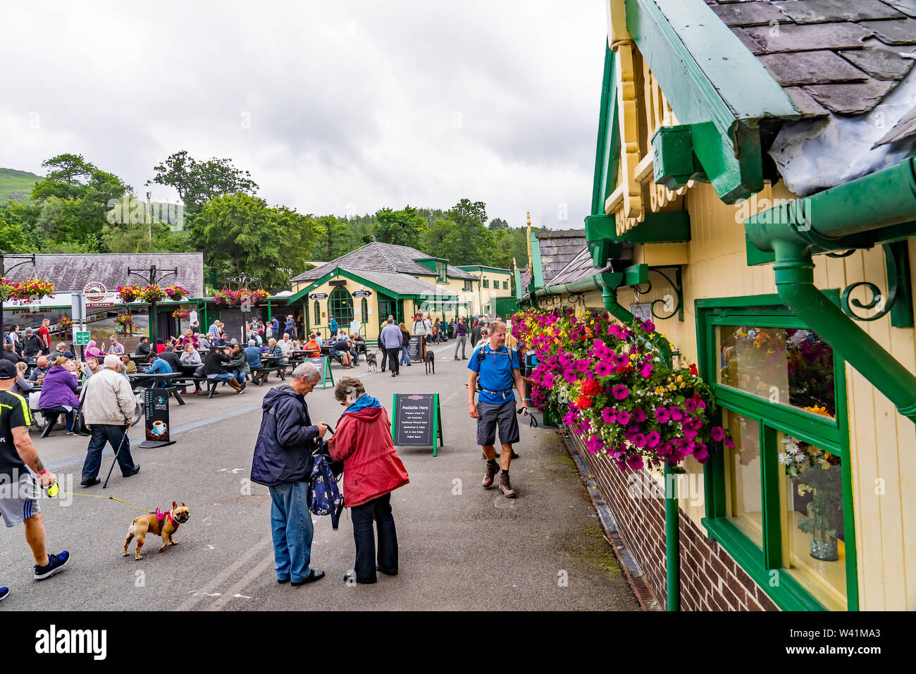 Tourists outside Llanberis train station waiting for a ride to the ...