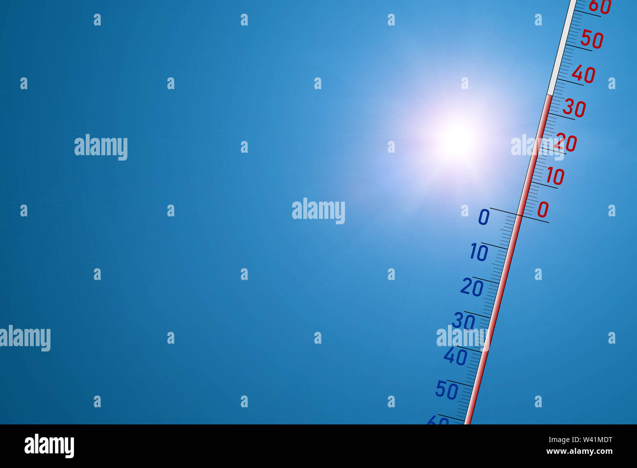 The thermometer on a blue background and in bright sun shows 35 degrees ...