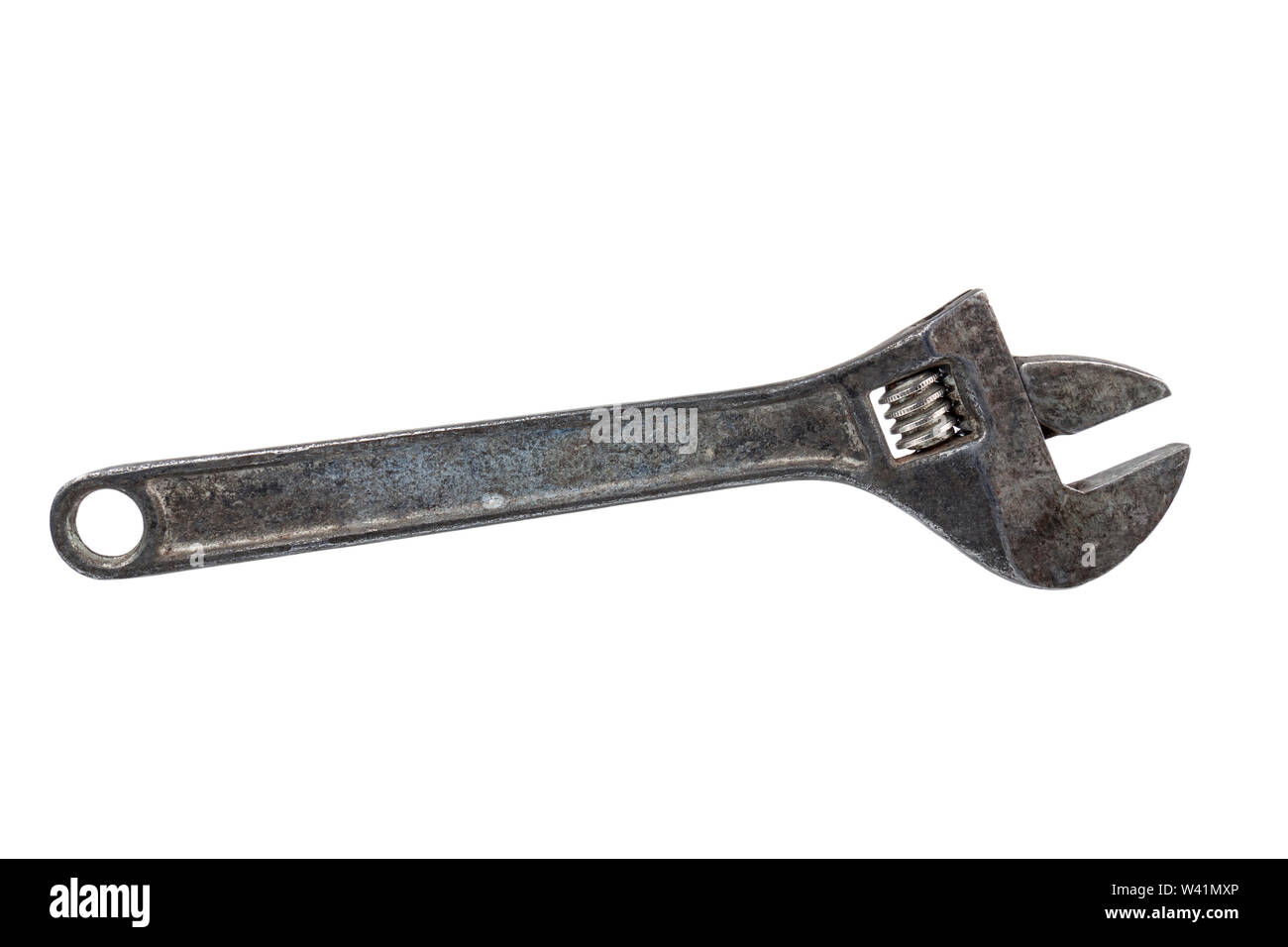 Old adjustable wrench close-up on a white background Stock Photo - Alamy
