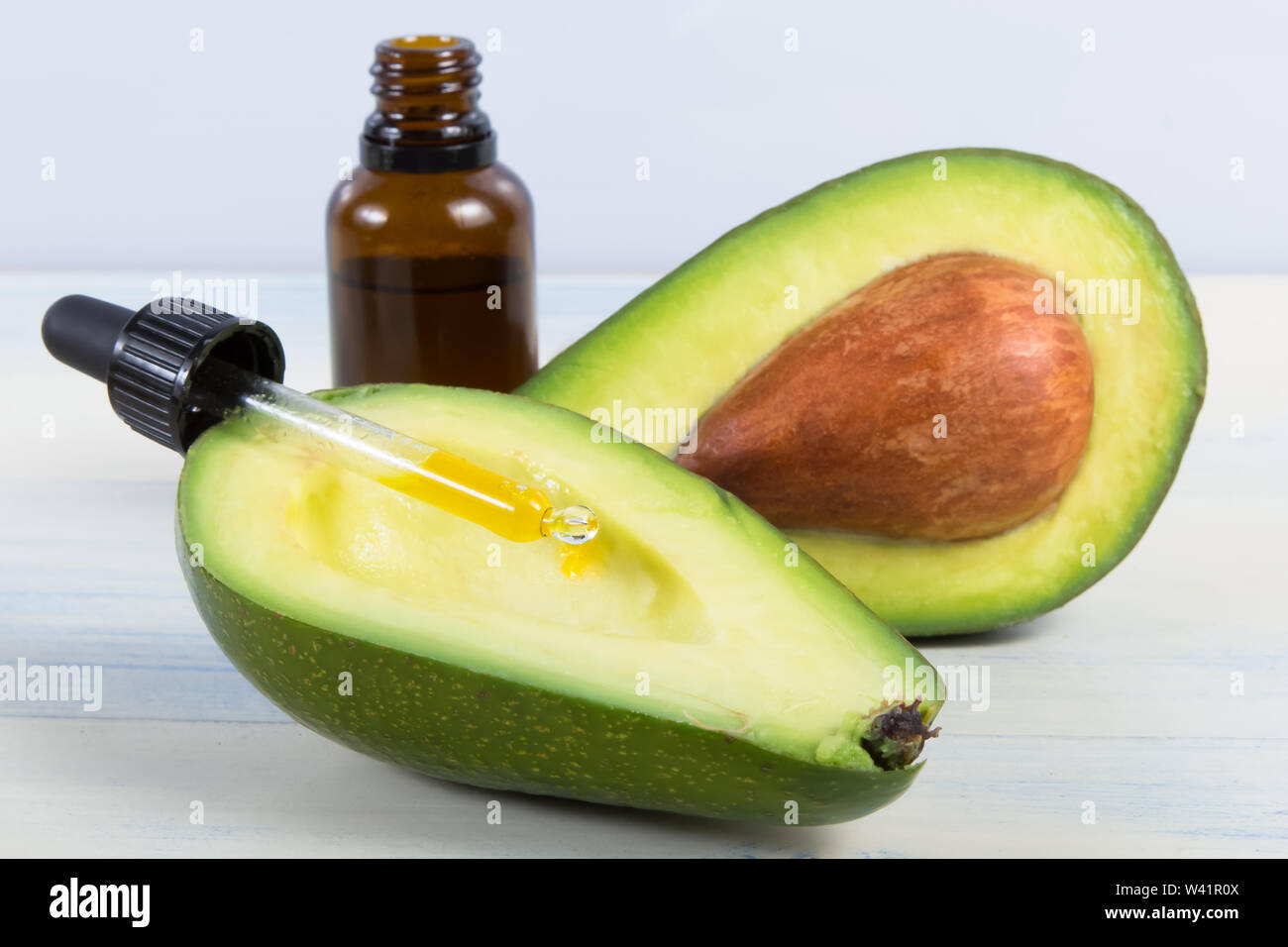 Avocado fruit and oil Stock Photo - Alamy