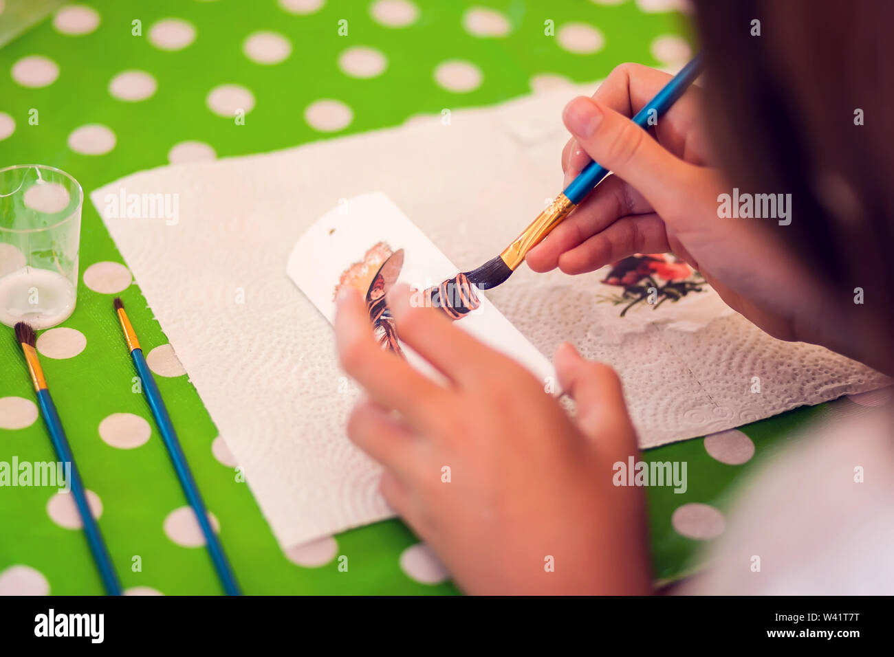 Children hands making artworks with wood and paint crafts. workplace ...