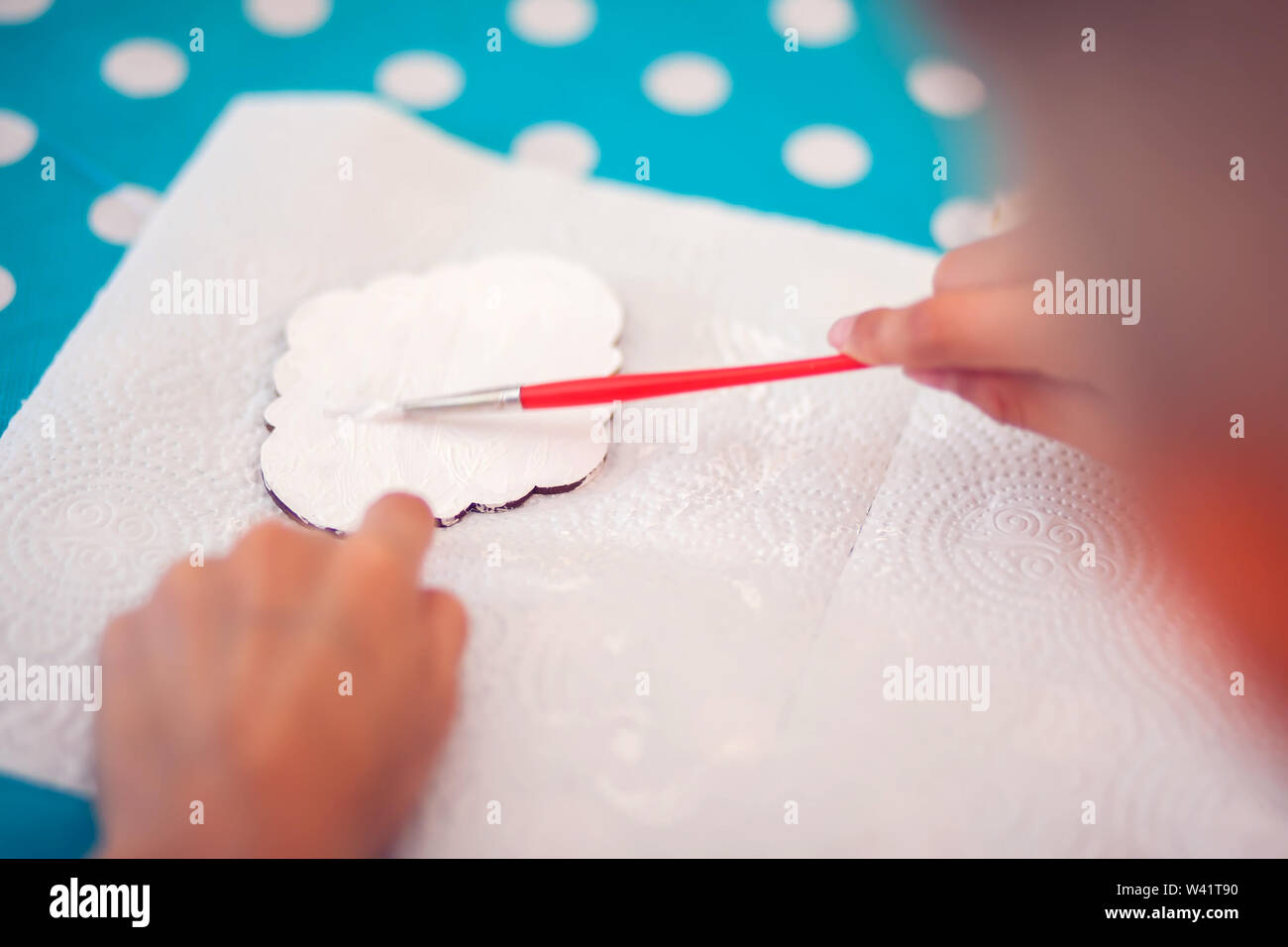 Children hands making artworks with wood and paint crafts. workplace ...