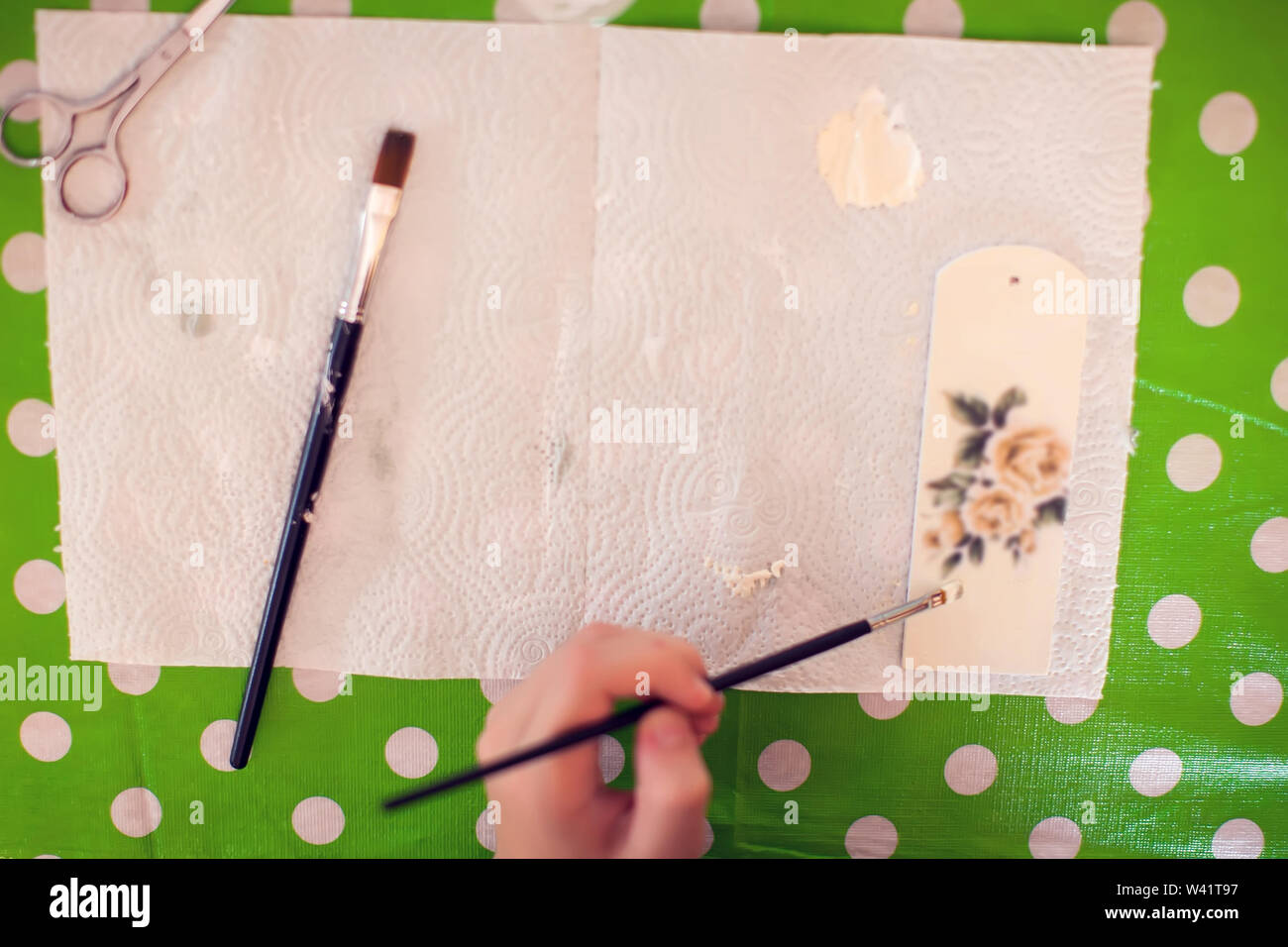 Children hands making artworks with wood and paint crafts. workplace ...