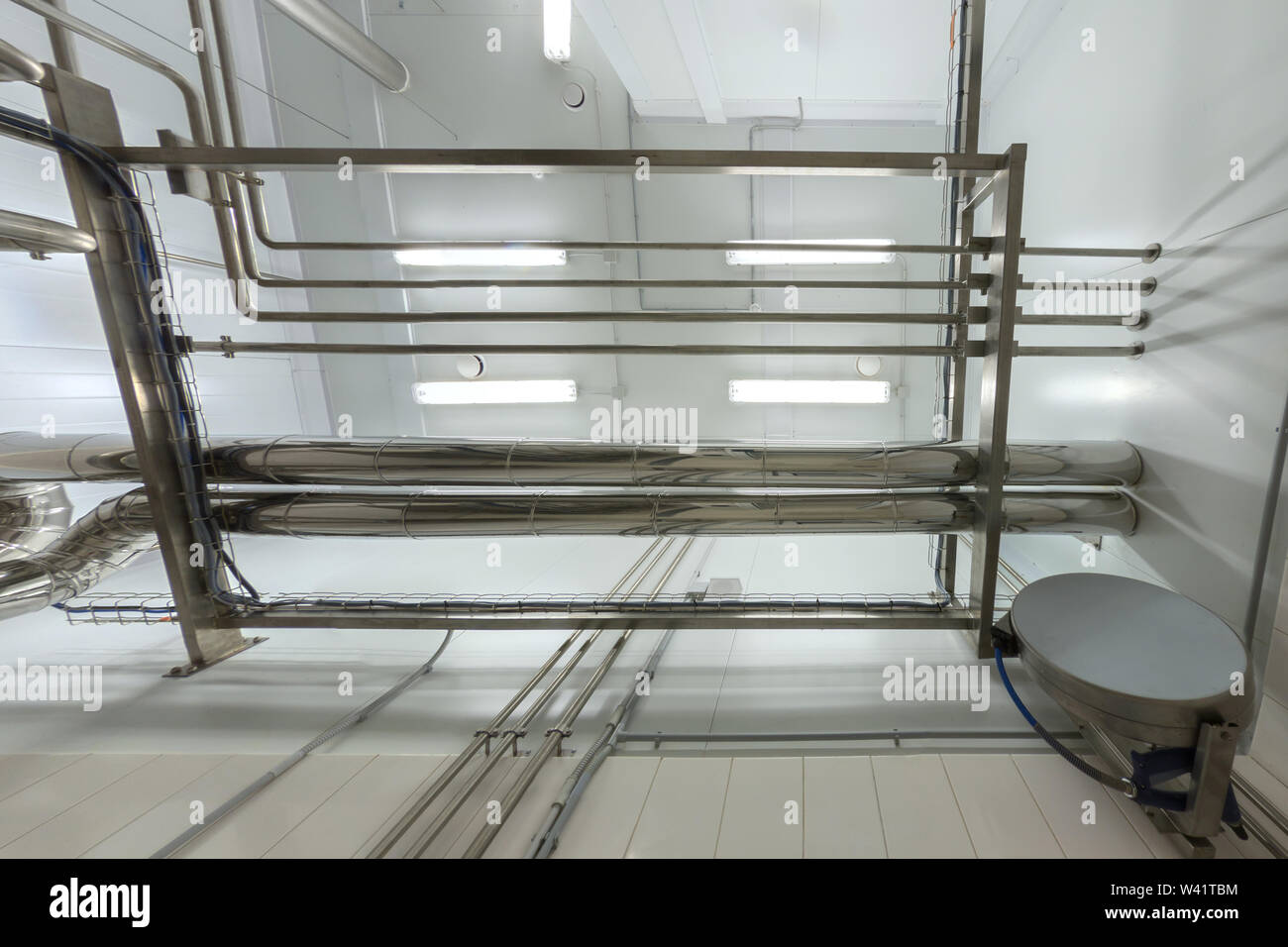 Industrial shiny steel pipeline overhead ceiling upward background ...