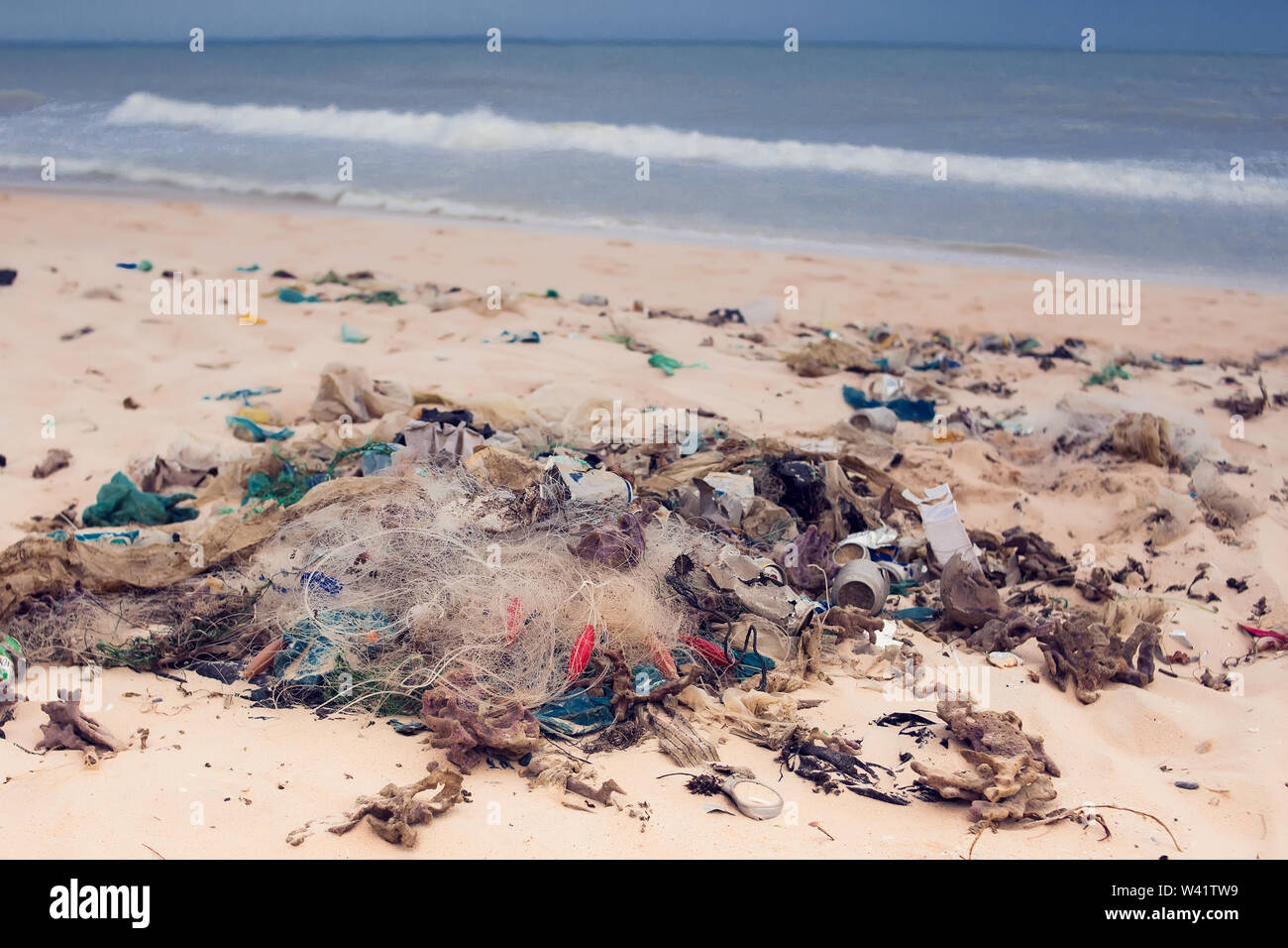 Garbage on a beach, environmental pollution concept picture Stock Photo ...
