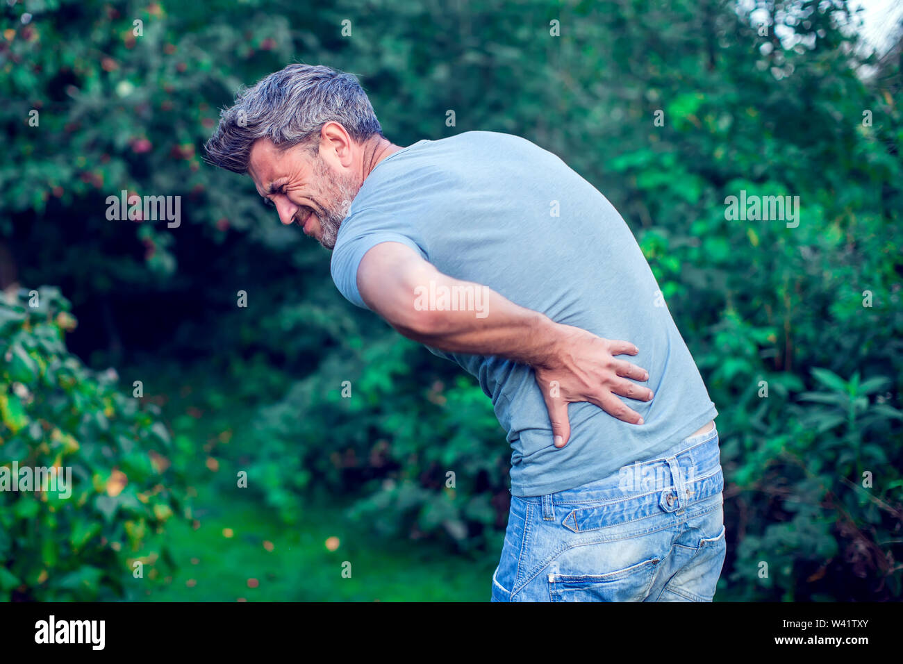 Medical, healthcare and problem concept. Unhappy man suffering from ...