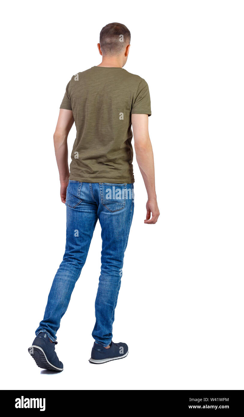 Back view of going handsome man. walking young guy . Rear view people ...