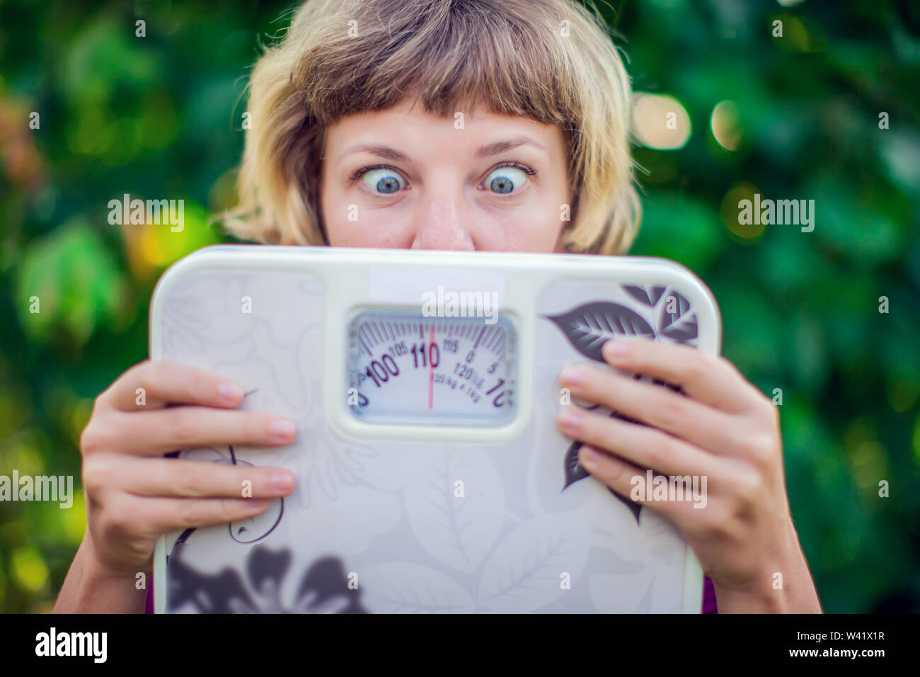 Man standing holding scales hi-res stock photography and images - Alamy