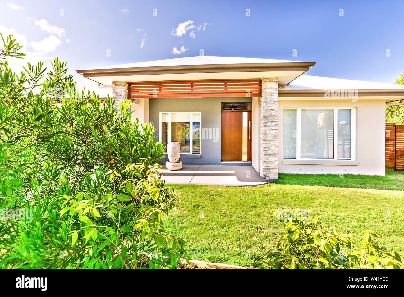 Perfect lightning in photograph, green grass ground in home entrance ...
