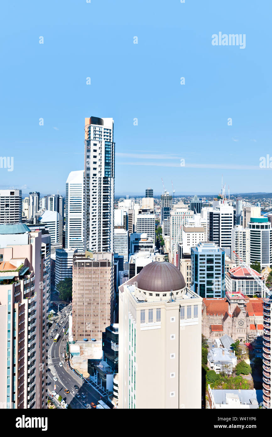 Modern city buildings with roads showed in high angle view and blu ...