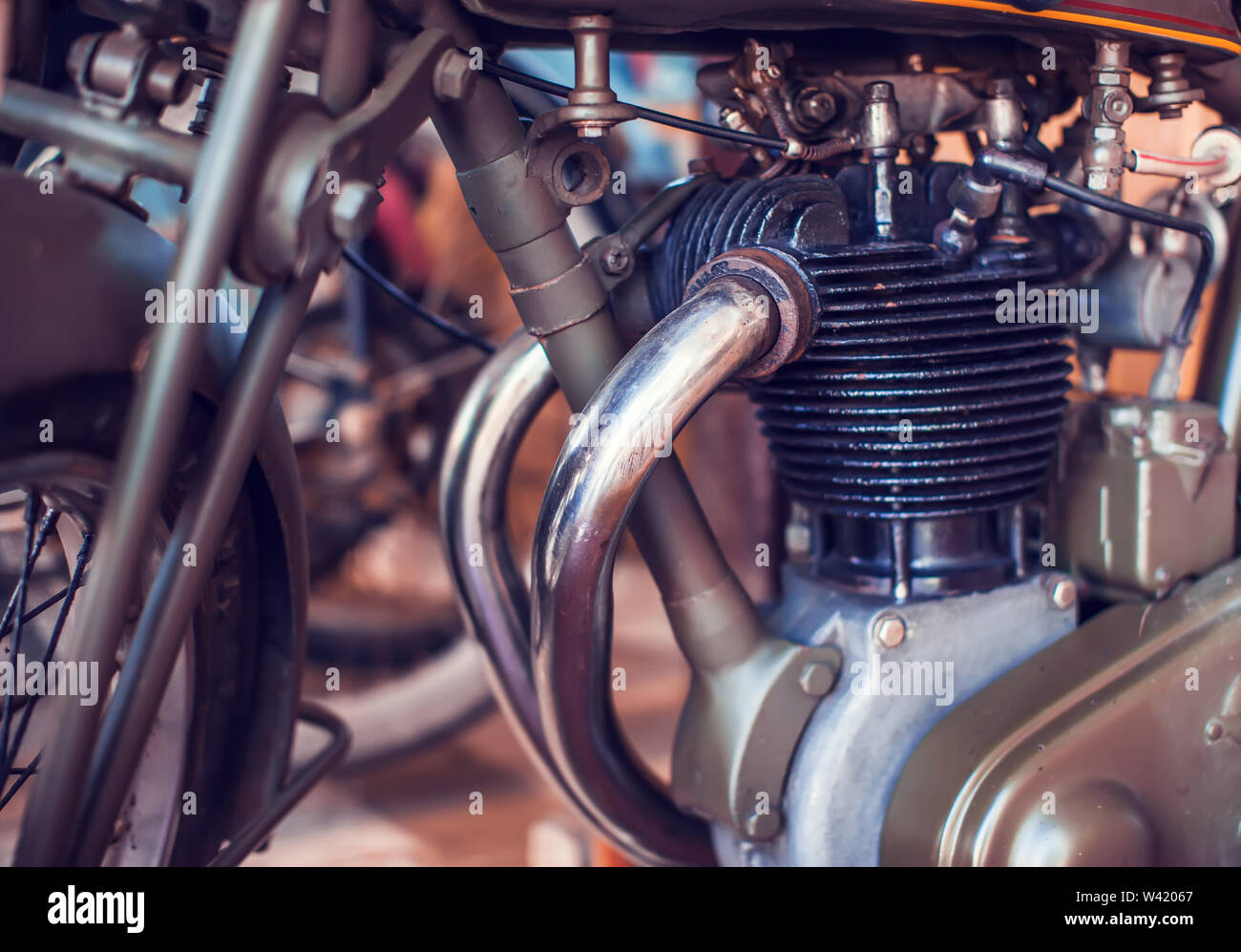 Motorcycle engine and manifold vintage old Stock Photo - Alamy