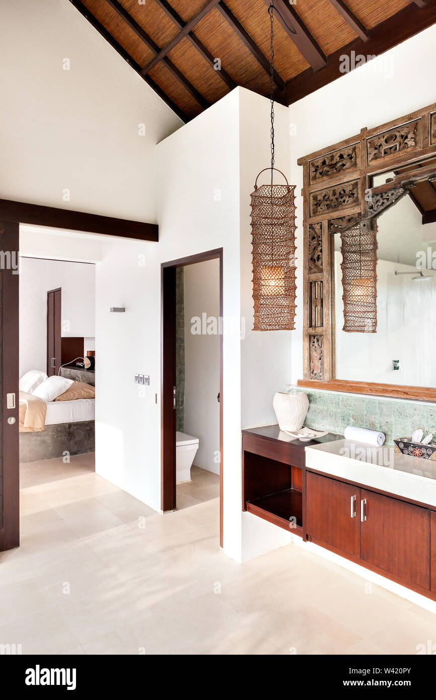 Outdoor washing area with the toilet and the bedroom attached together ...