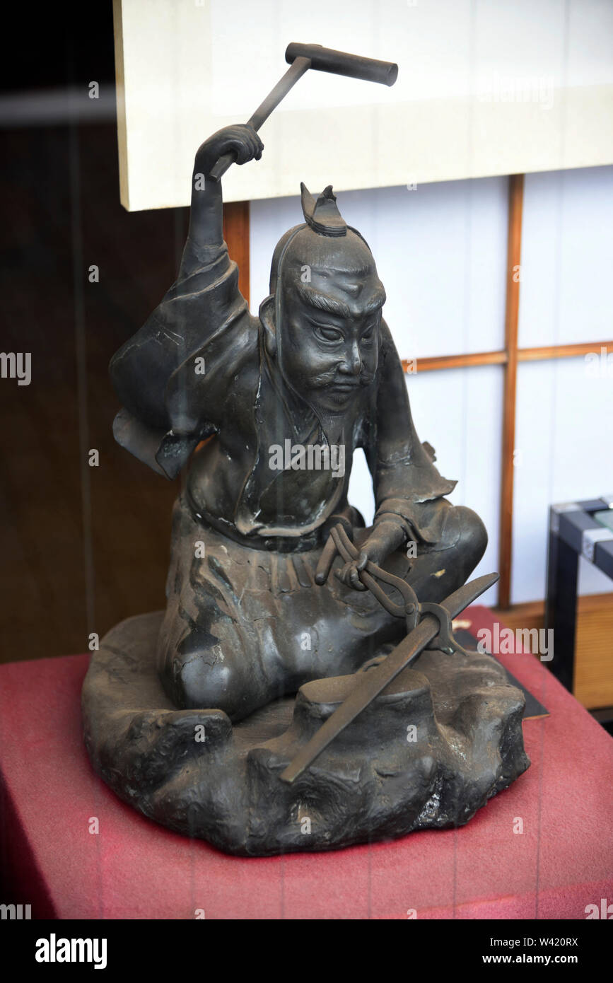 statue of ancient Japanese Blacksmith Stock Photo - Alamy