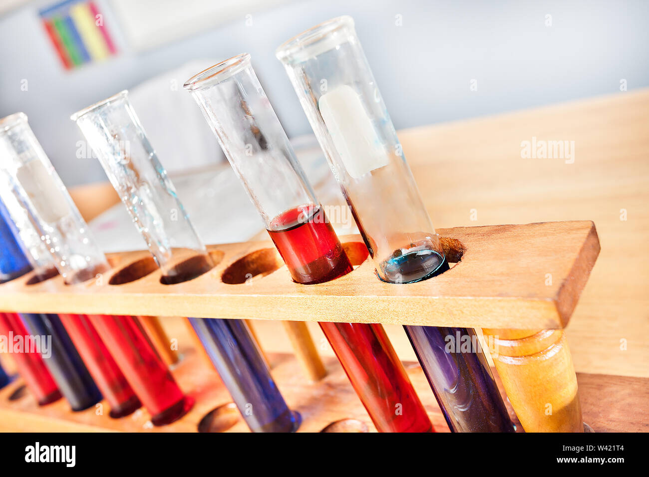 Science laboratory equipments including sample test tubes in a rack ...