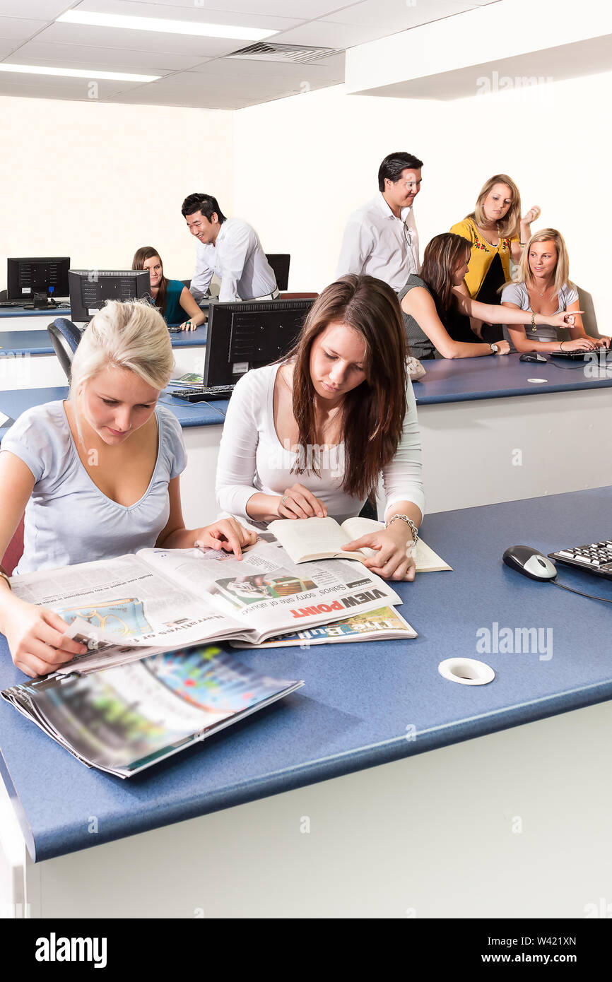 People working in a newspaper office hi-res stock photography and ...