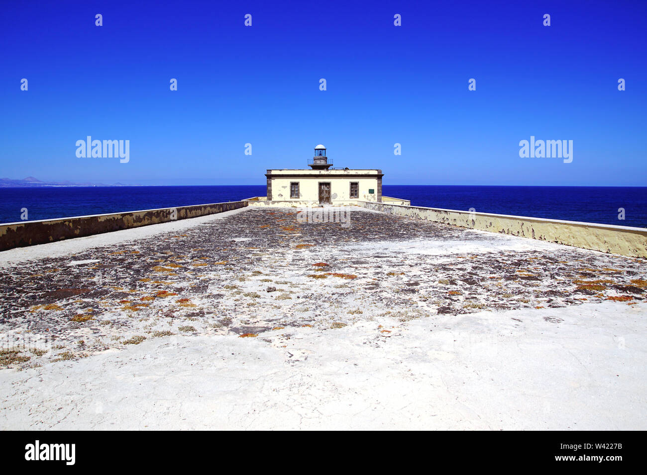 The Punta Martiño Lighthouse on Isla de Lobos in Fuerteventura, Spain ...