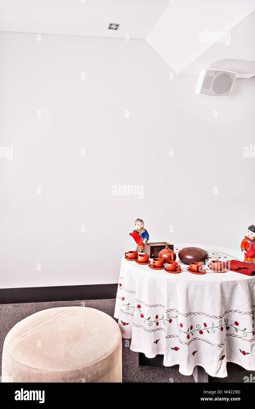 Chinese traditional tea table ready to serve with brown cups and tea ...