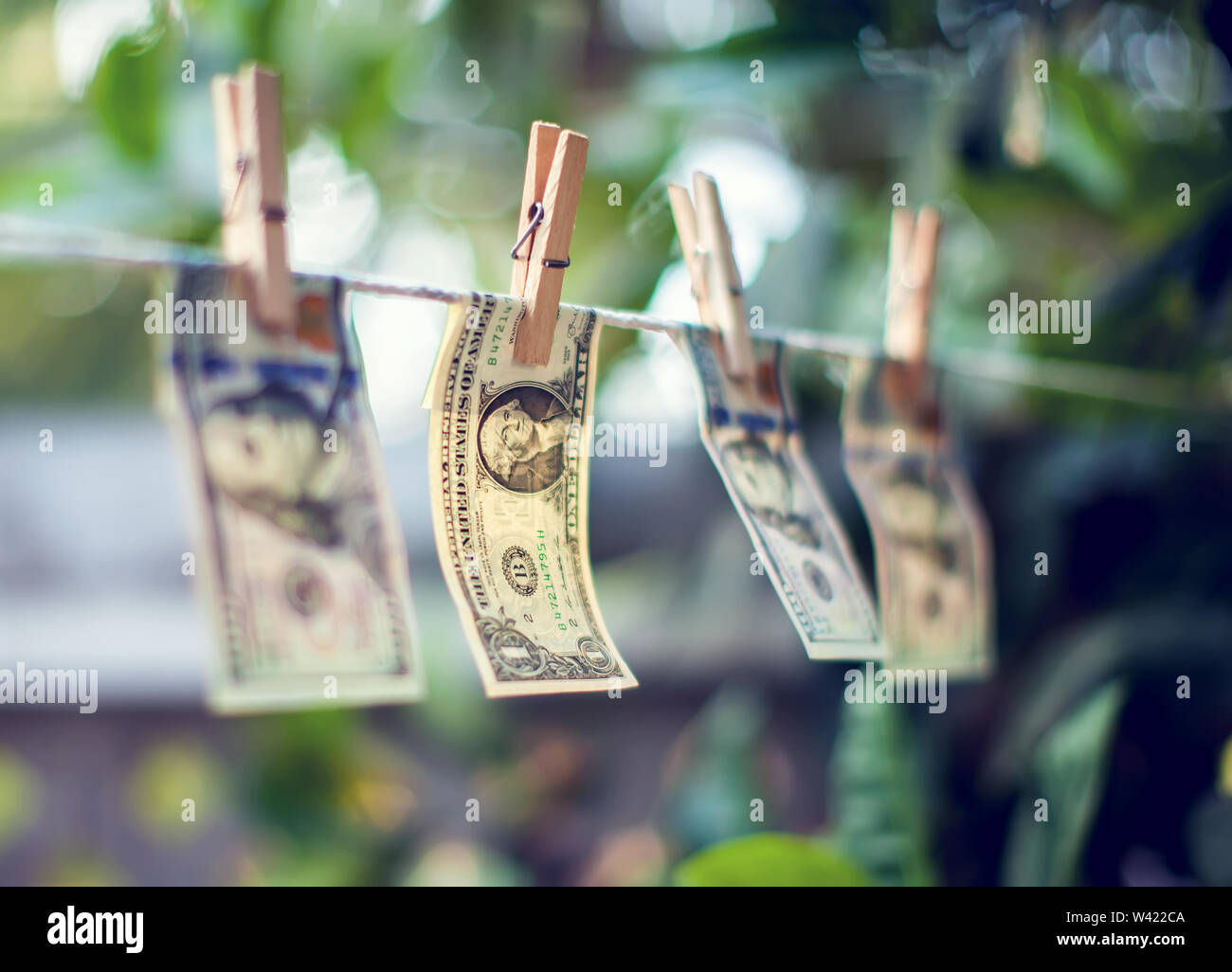 US dollar banknotes hanging on rope for money laundering conept Stock ...