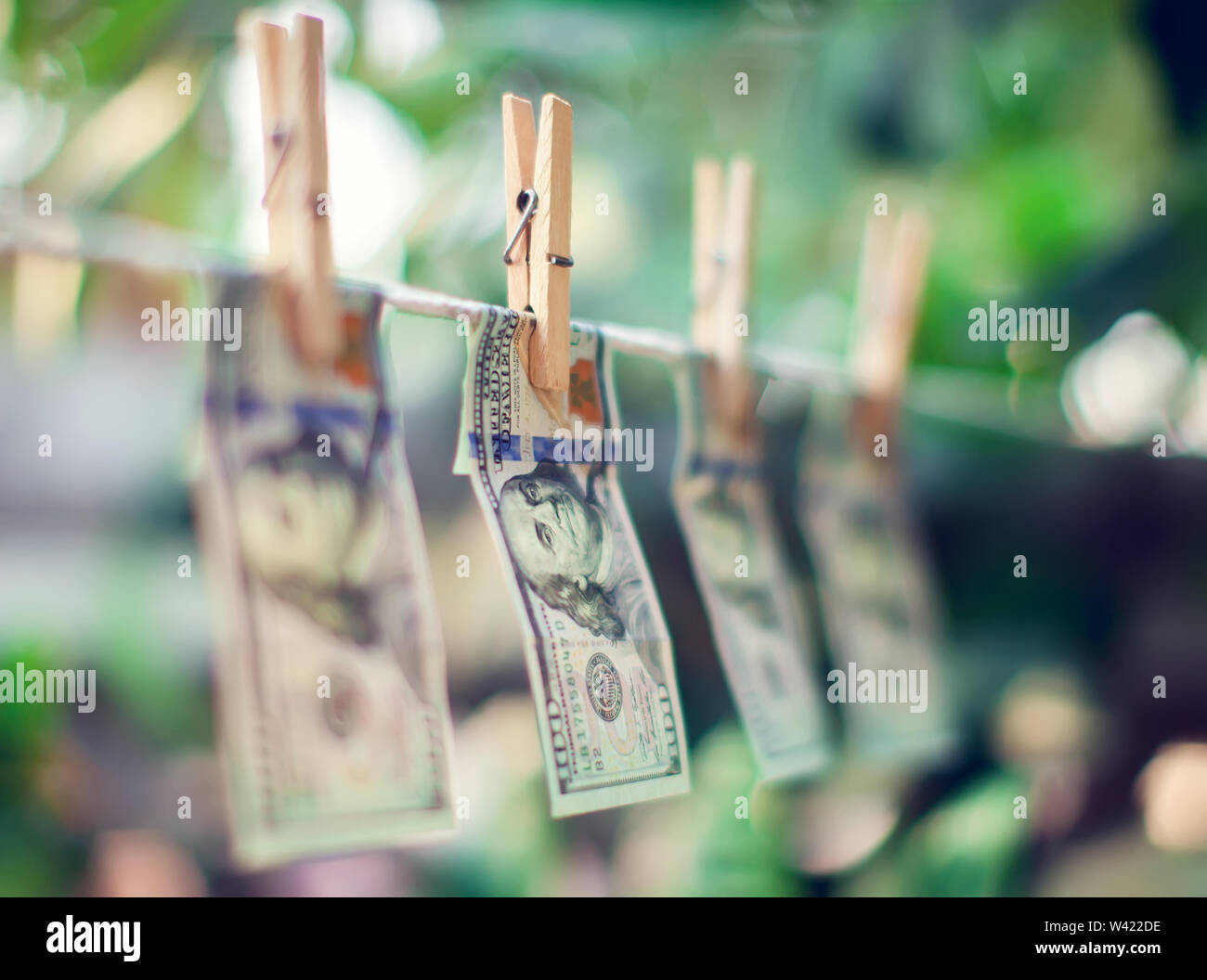 US dollar banknotes hanging on rope for money laundering conept Stock ...