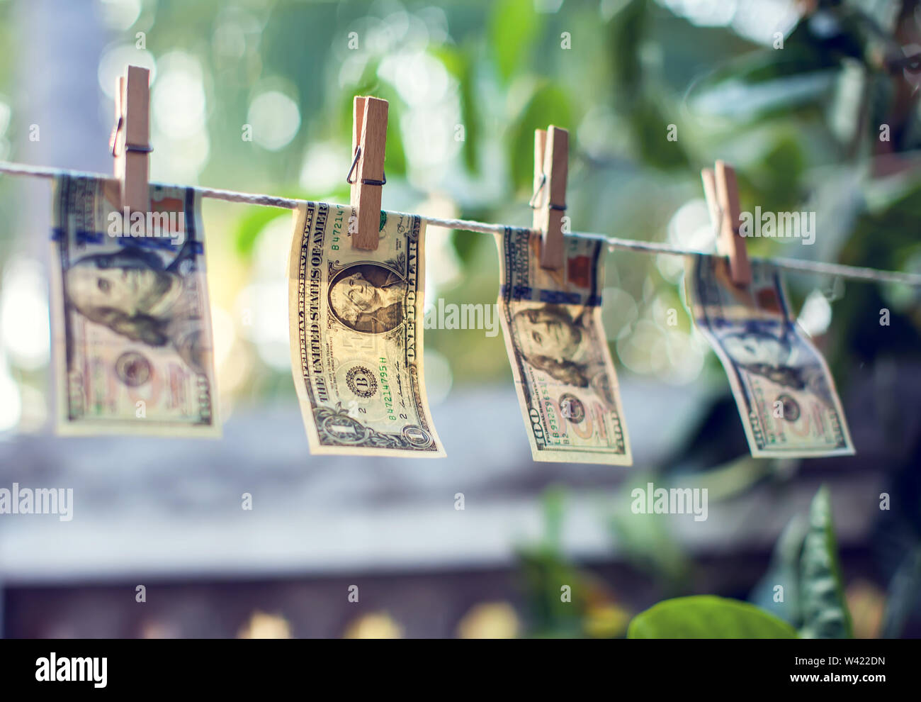 US dollar banknotes hanging on rope for money laundering conept Stock ...