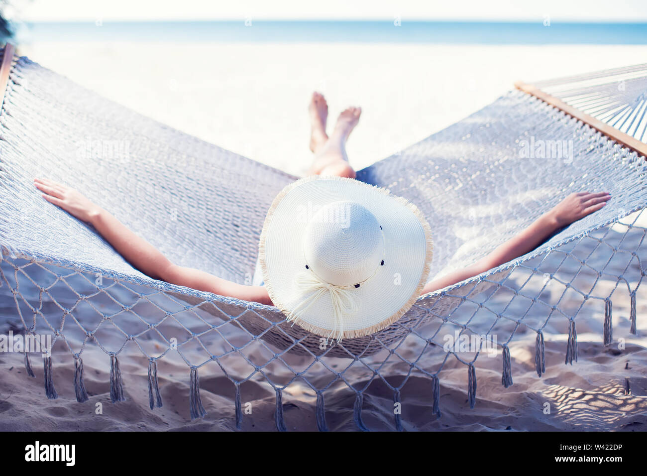 Woman balancing chair hi-res stock photography and images - Alamy