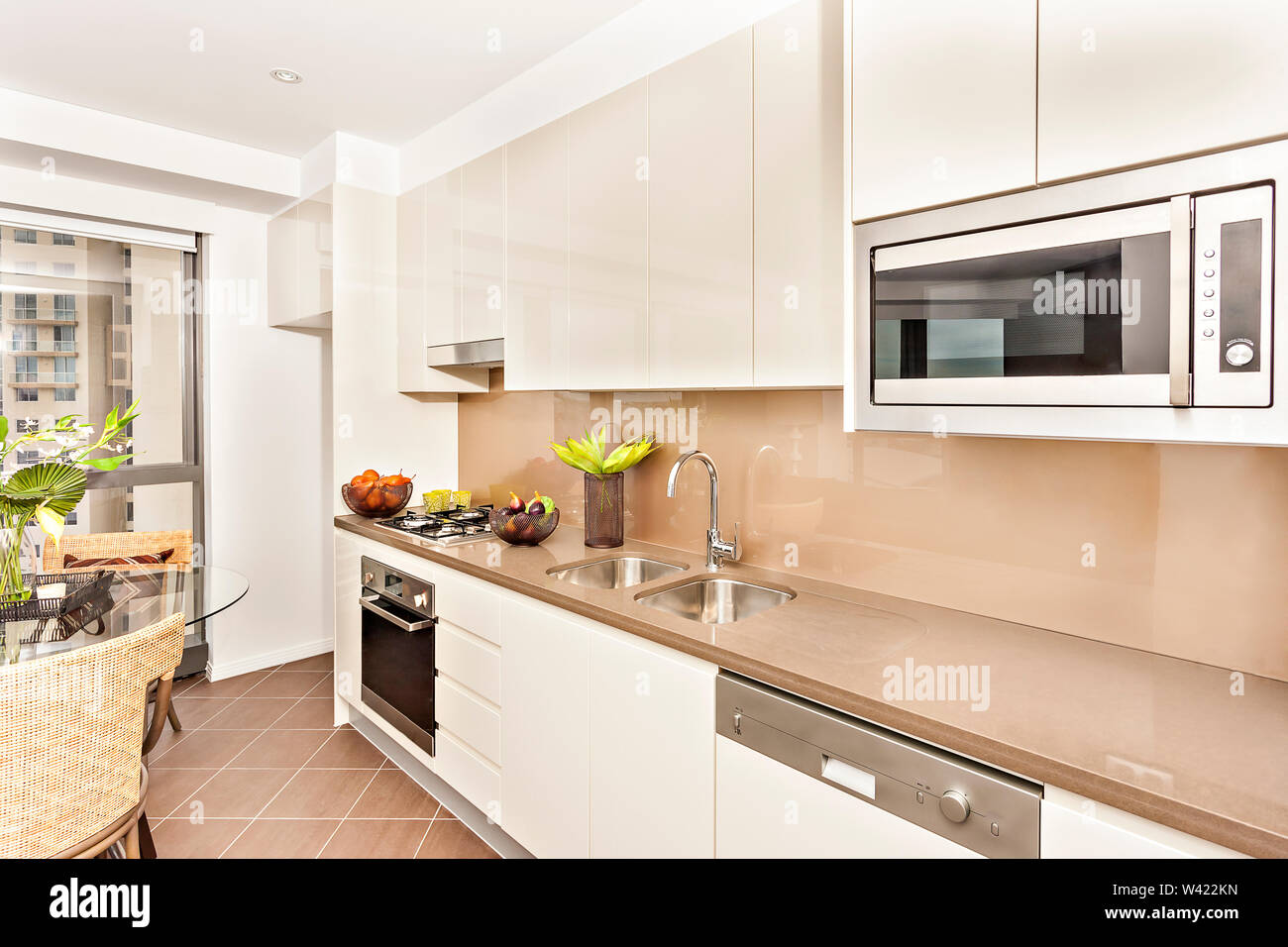 Kitchen with luxurious tools and white walls, luxury living room ...