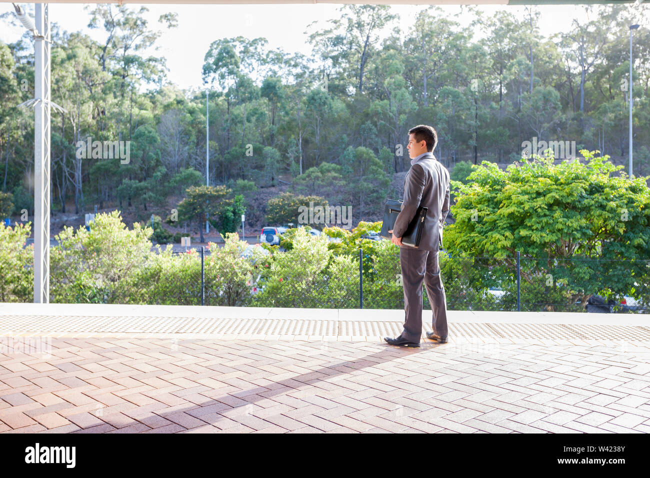 Boy Waiting For Someone
