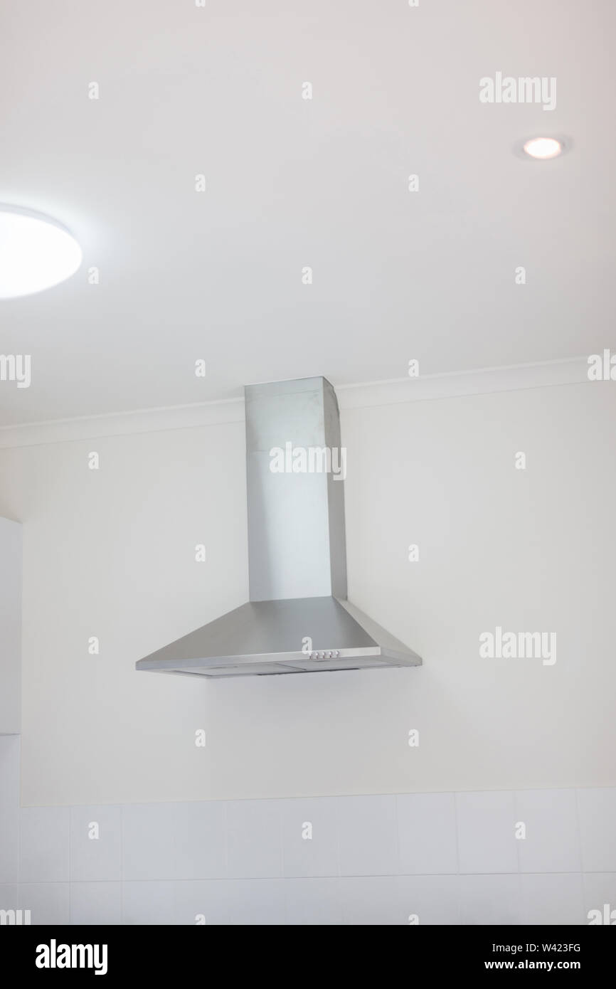 A view of a modern kitchen chimney Stock Photo - Alamy