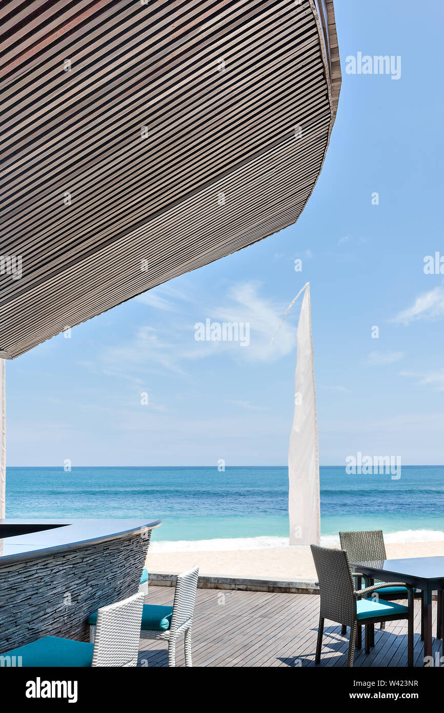 Outside hotel area at sea, water side with blue sky and horizon with ...