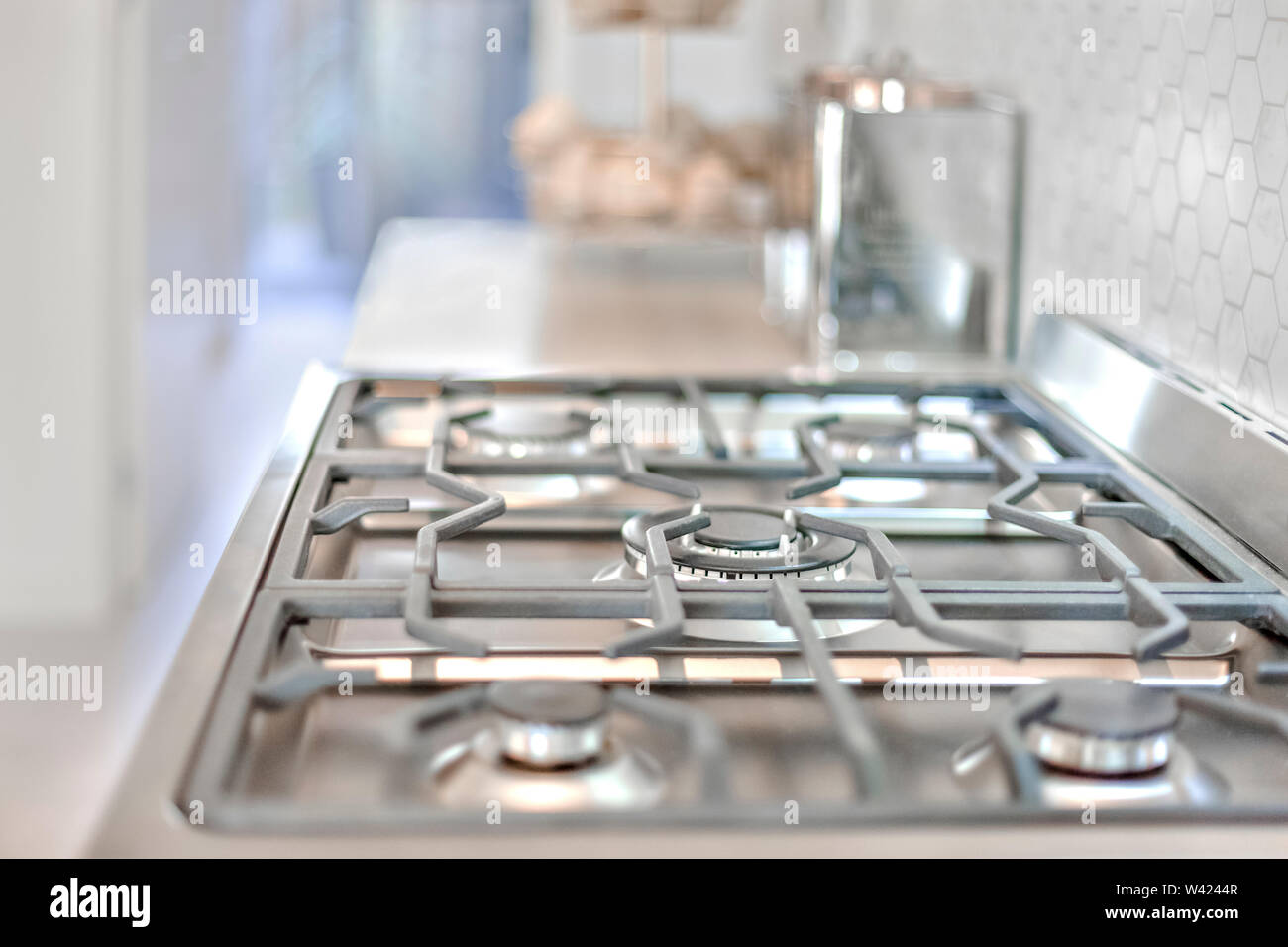 Modern stove top view closeup with a blurred background in a modern ...