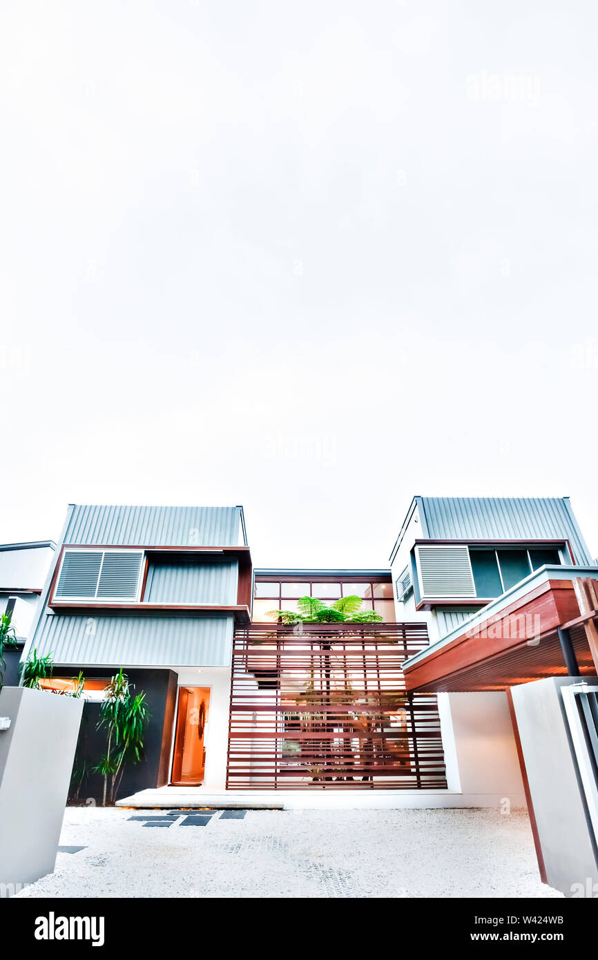 Modern building like a factory front side with the sky, there are ...