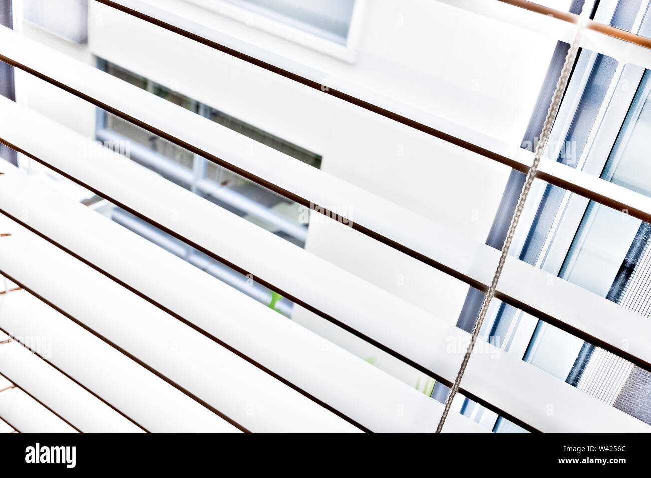 Opened window close up with curtain filter showed outside that ...