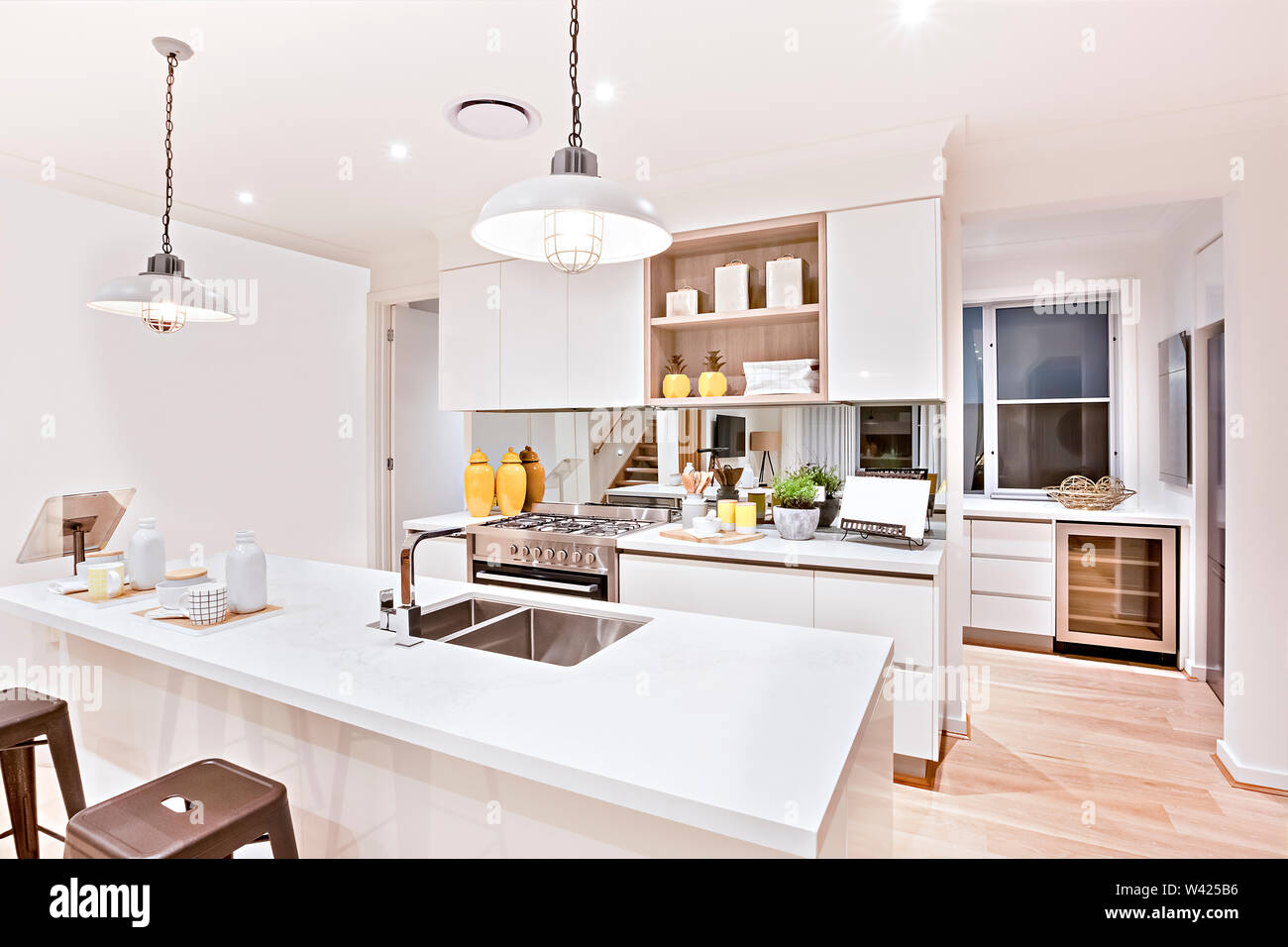 House interior with kitchen decorations including lights and counter ...
