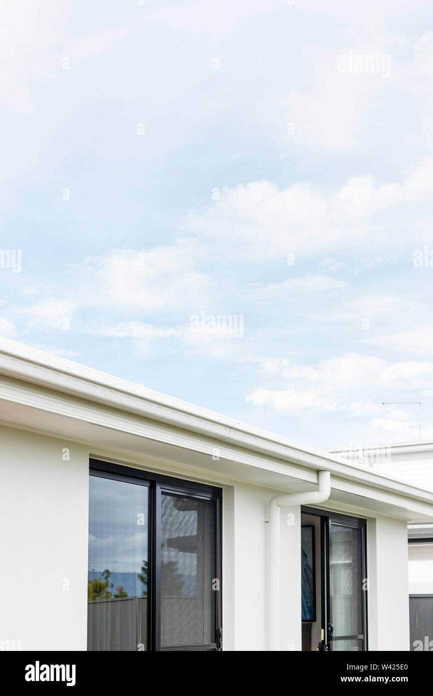 Stylish windows with a black frame against white walls and a white ...