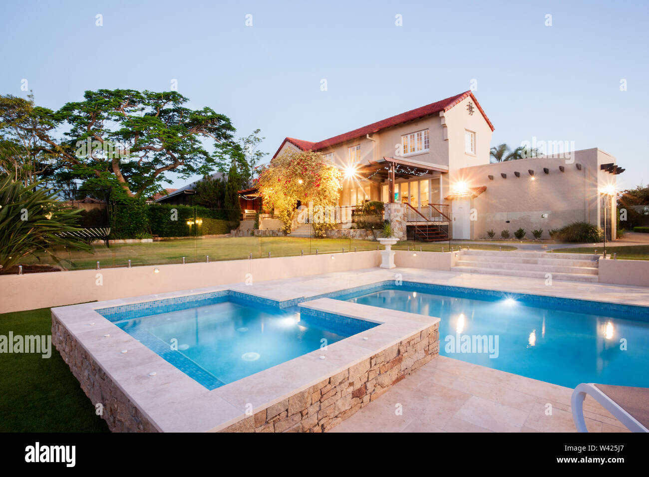 Luxury house garden decoration with a swimming pool side with flashing ...