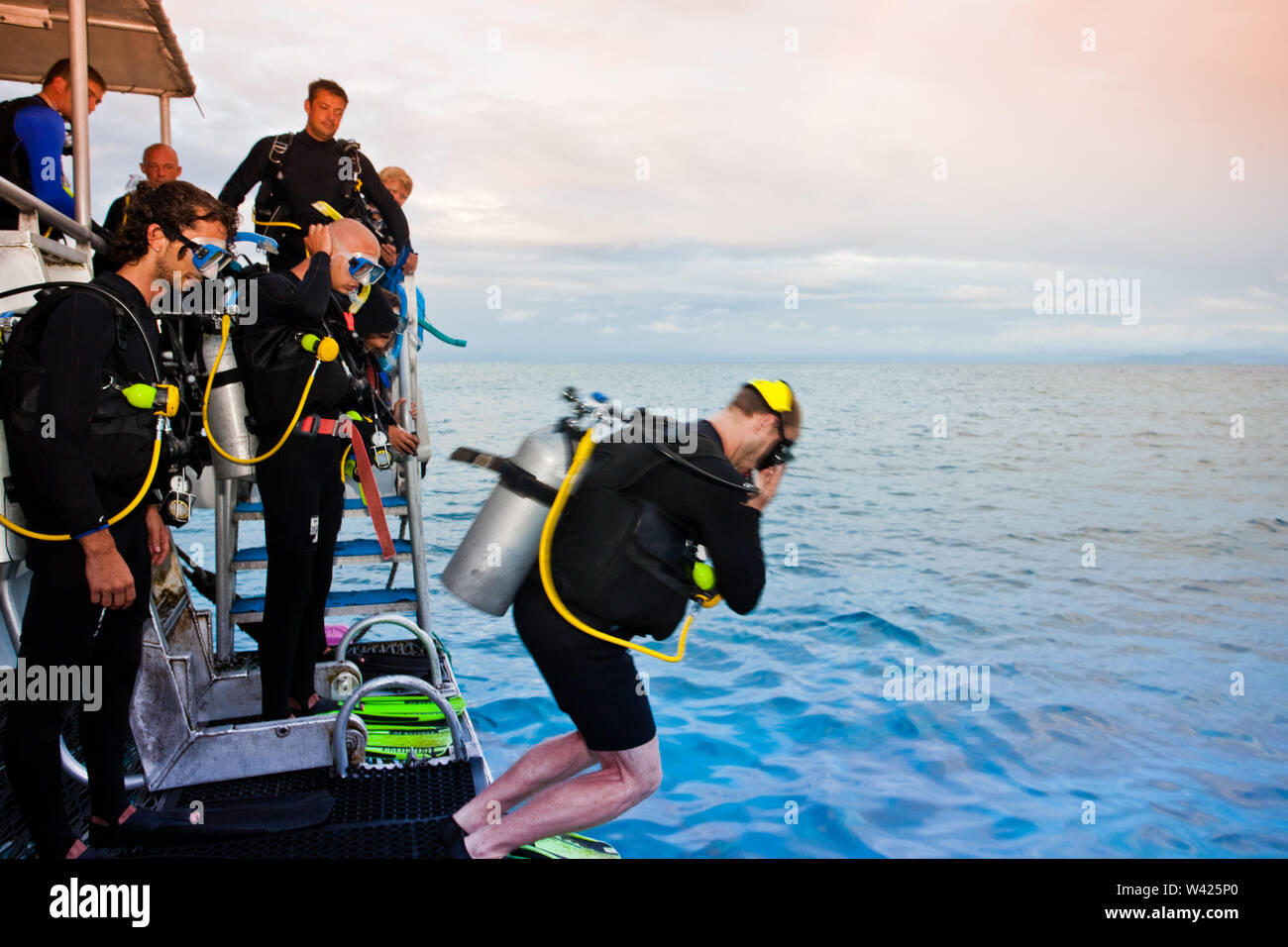 A man diving in the sea with breathing apparatus Stock Photo - Alamy