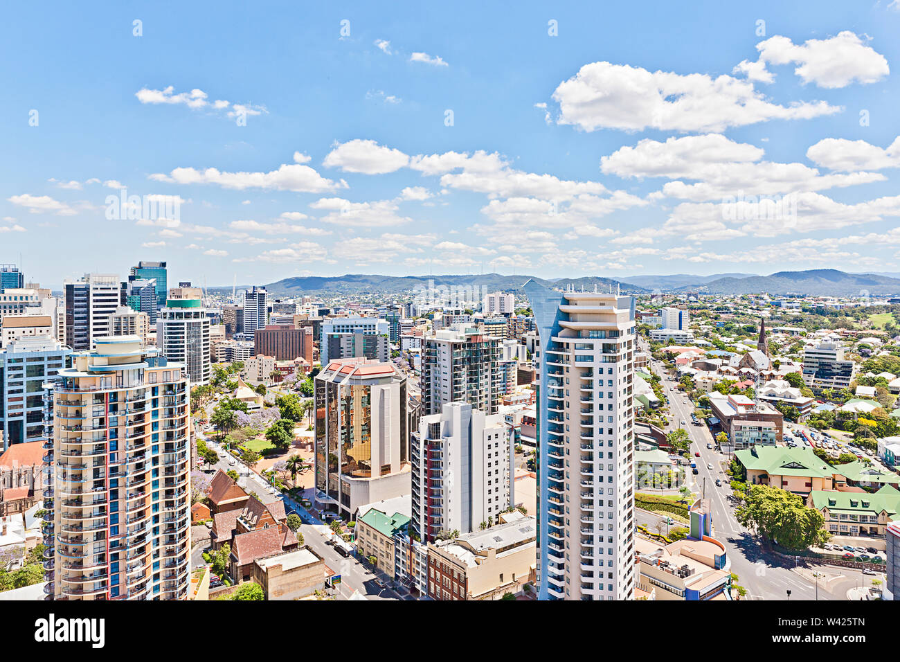Full city building designs and trees, green plants near road, tree ...