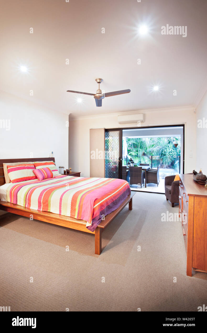 Side view of master bed with table, comfortable beds with designs ...