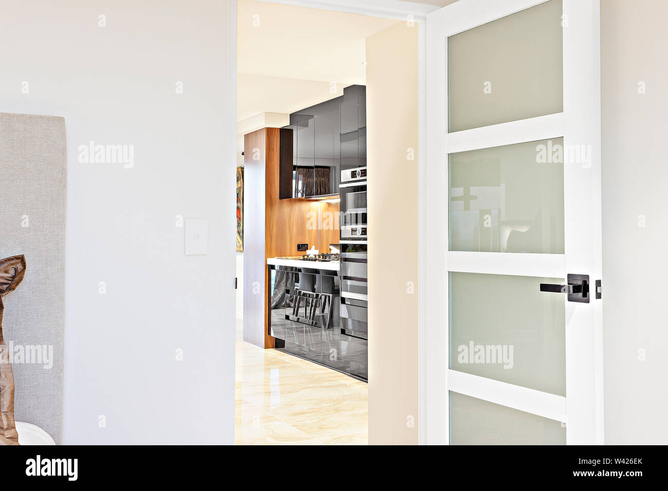 A simple doorway leading into the kitchen area Stock Photo - Alamy
