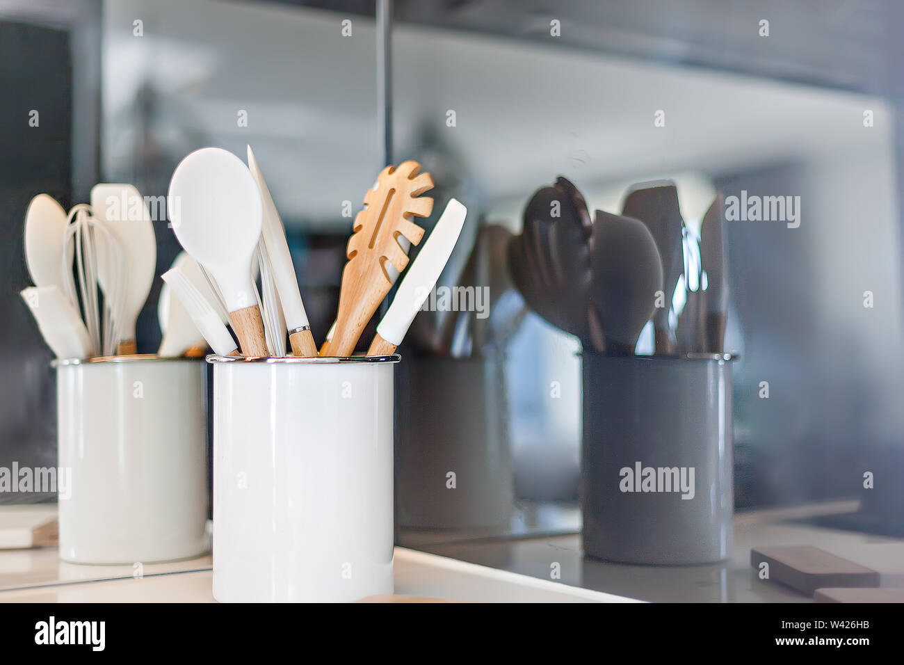 Clean kitchen tools with their reflection on the back wall Stock Photo ...