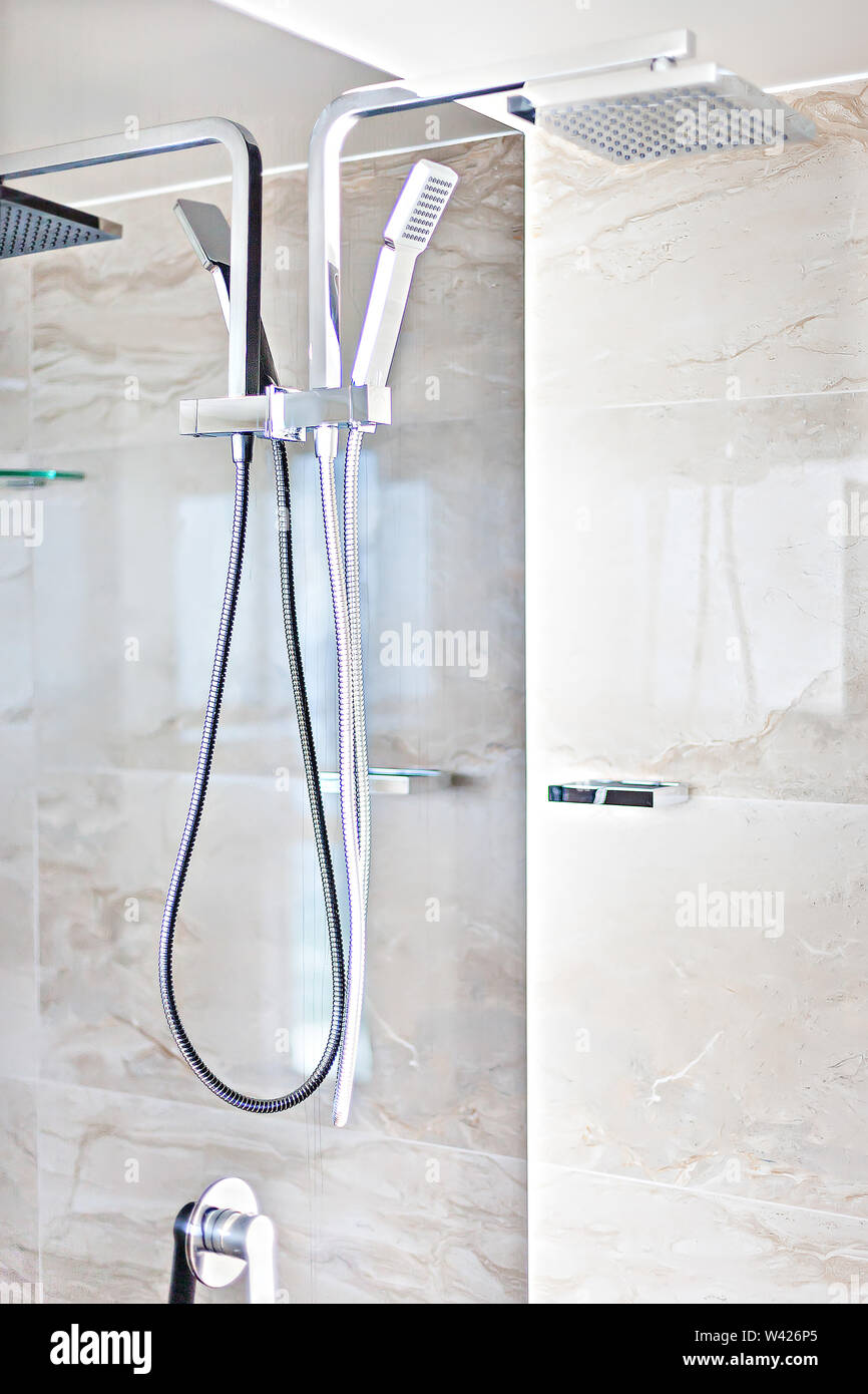 A contemporary shower area with tiled walls Stock Photo - Alamy