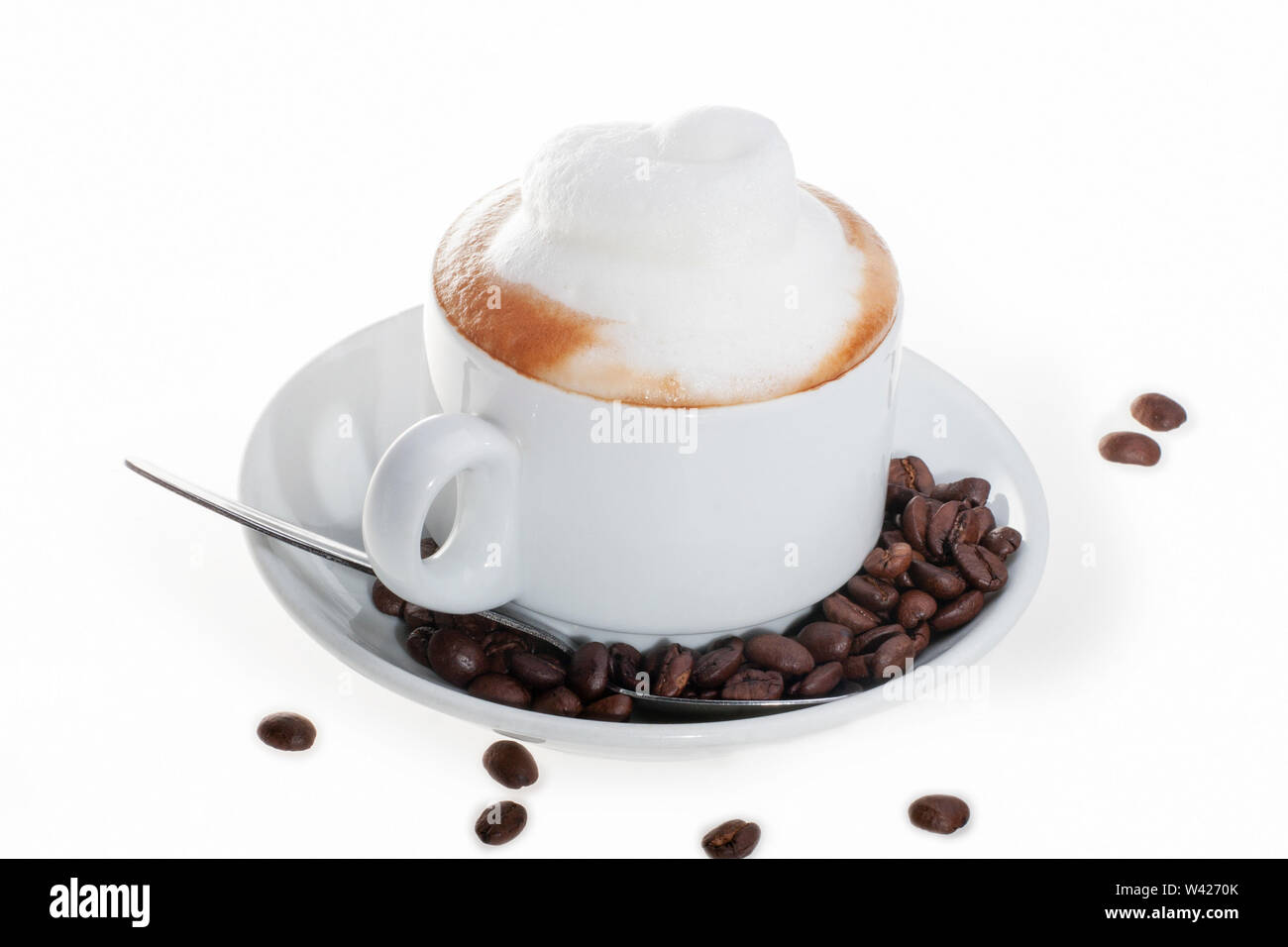 Milk mug with designs and coffee, white color cup and background ...