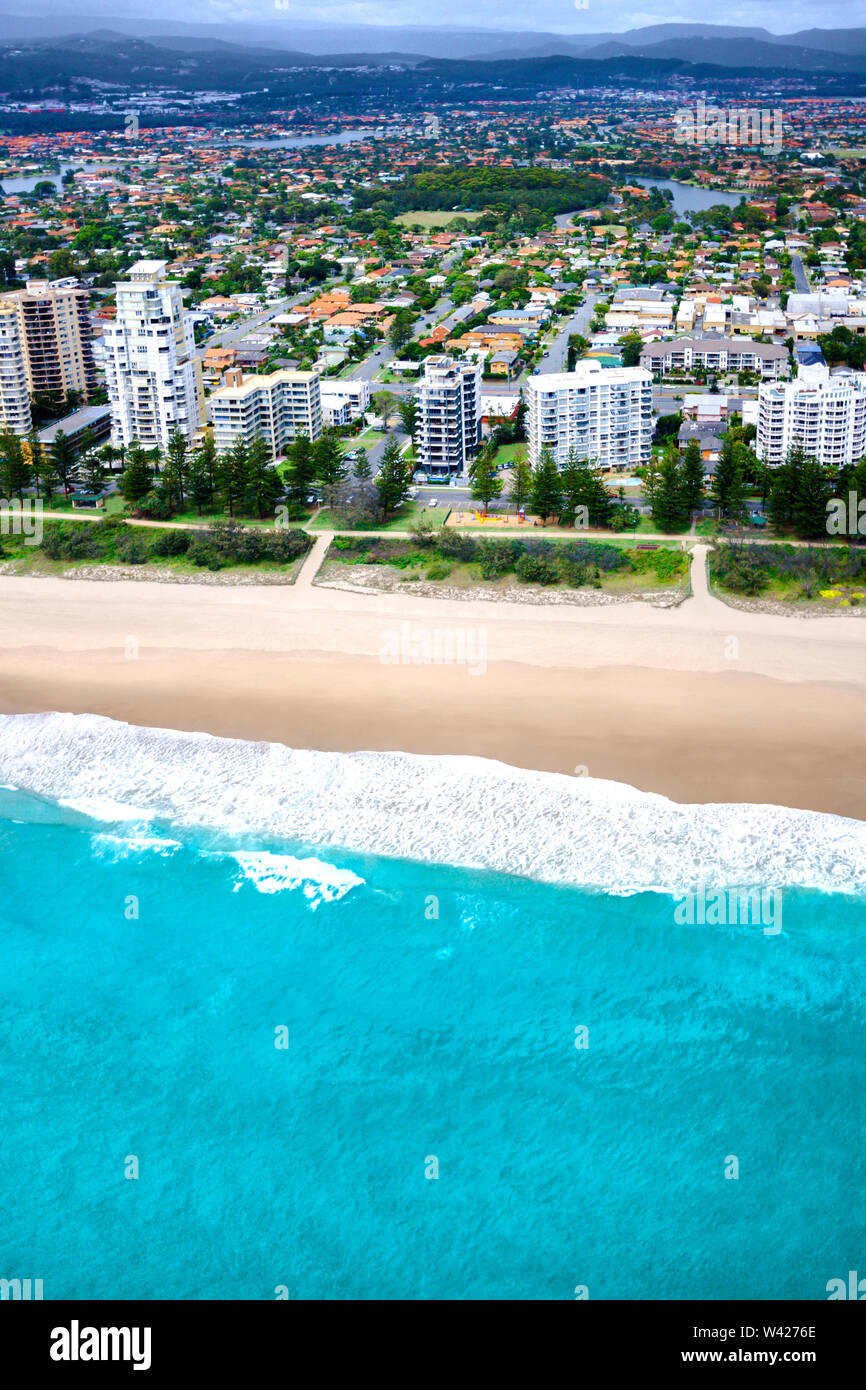 Empty beach bathed by a deep turquoise color sea located just in front ...