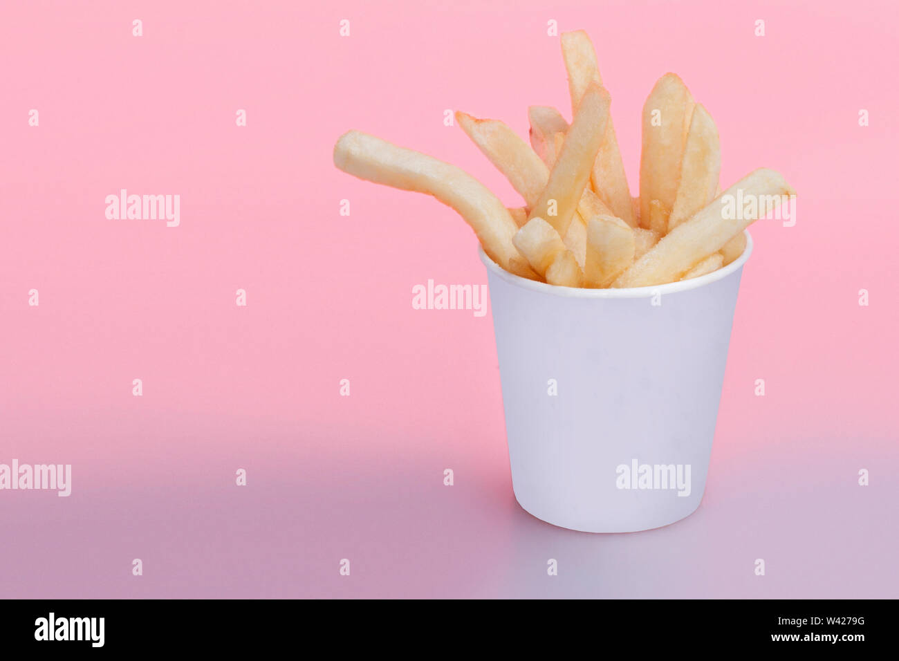 Close up of banana fried cup, this food is including salt, very shiny ...