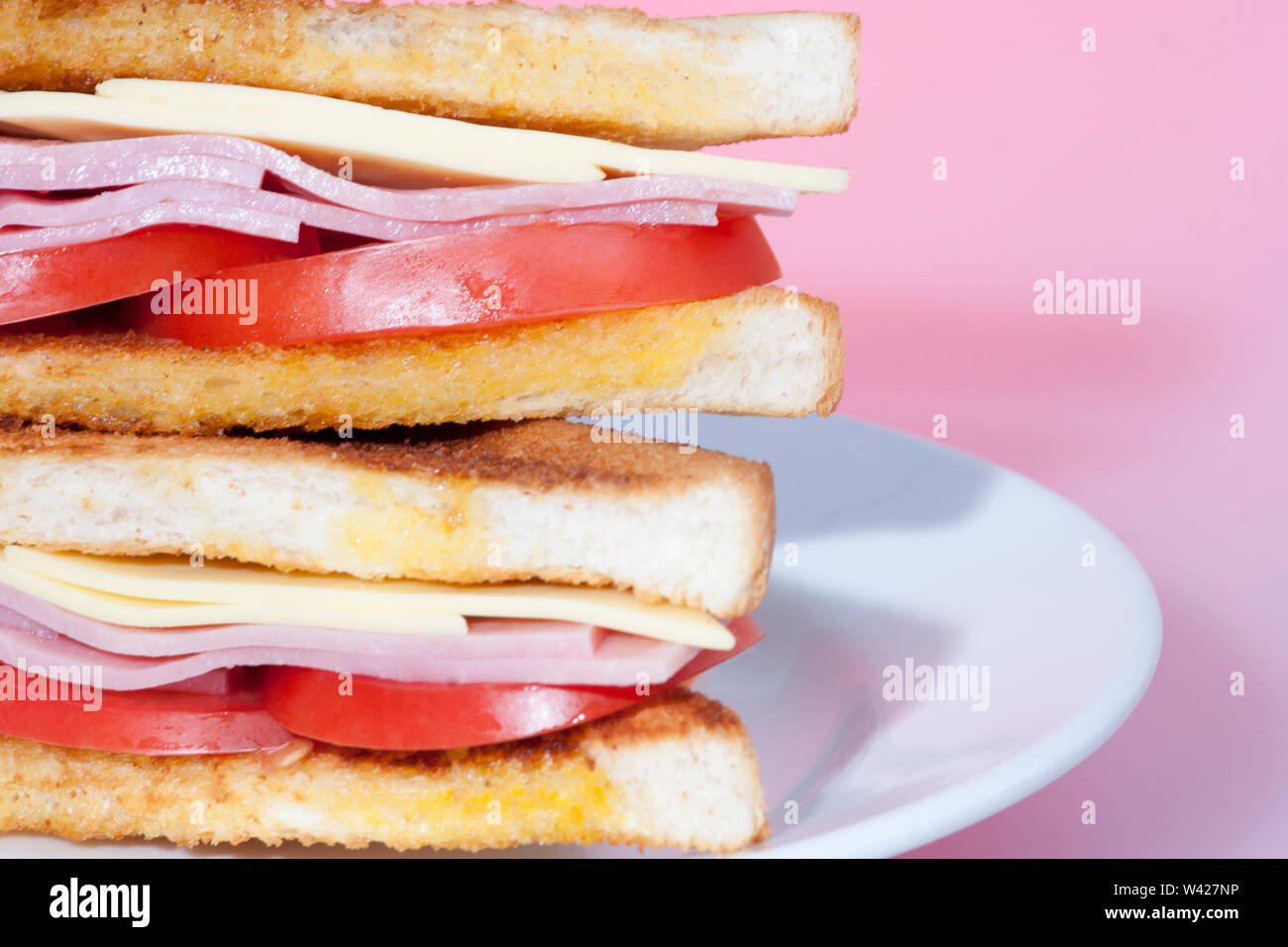 Close up of a big sandwich on plate, hot burger including meat and ...